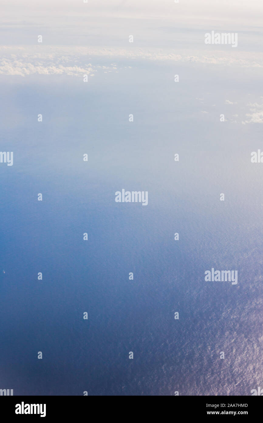 View from the porthole of an plane. Clouds over Atlantic Ocean Stock ...
