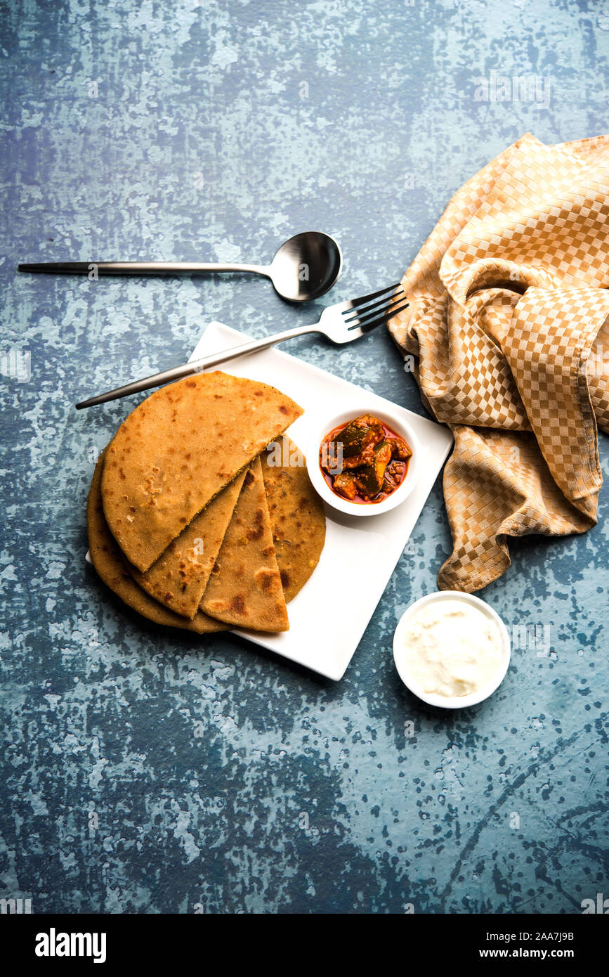 Sattu Ka Paratha / Stuffed Channa Dal Flour Paratha served with mango ...