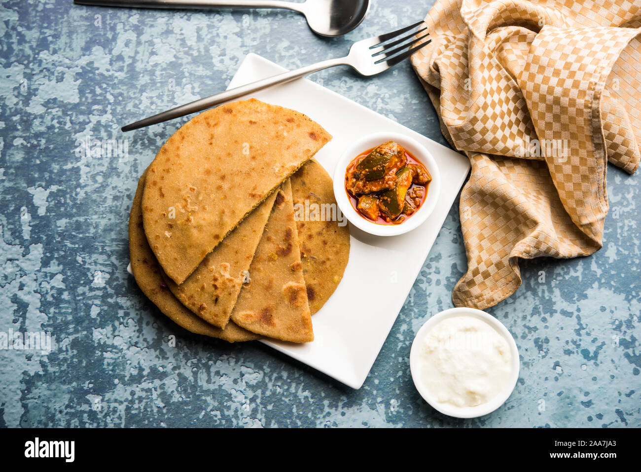 Sattu Ka Paratha / Stuffed Channa Dal Flour Paratha served with mango ...