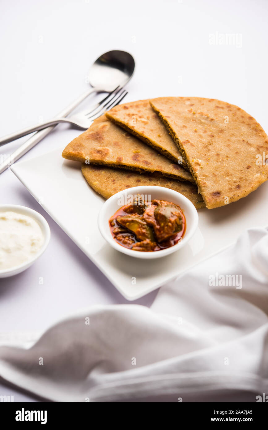 Sattu Ka Paratha / Stuffed Channa Dal Flour Paratha served with mango ...