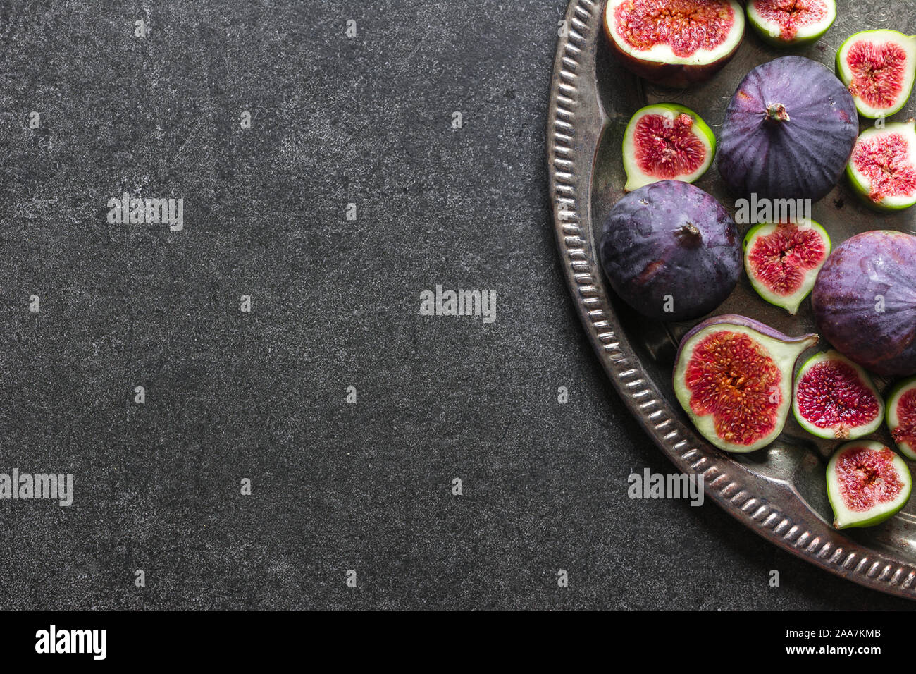 Fresh figs slices. Purple fig, top view Stock Photo - Alamy