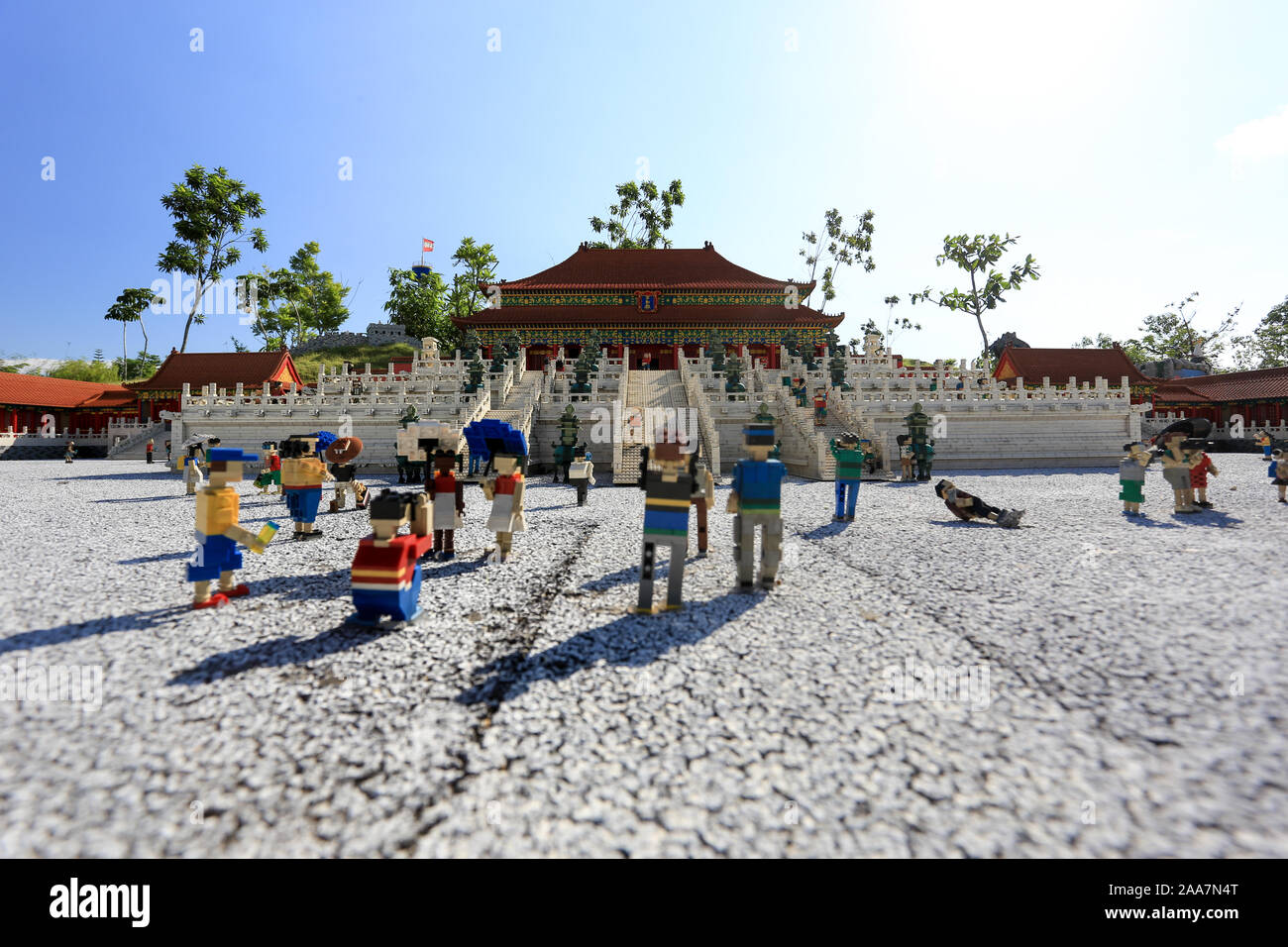 Miniature figurine and building made from brick block modeled after ...