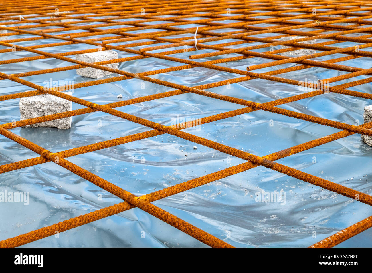 Metal reinforcement grid and wood frame for reinforced concrete ...