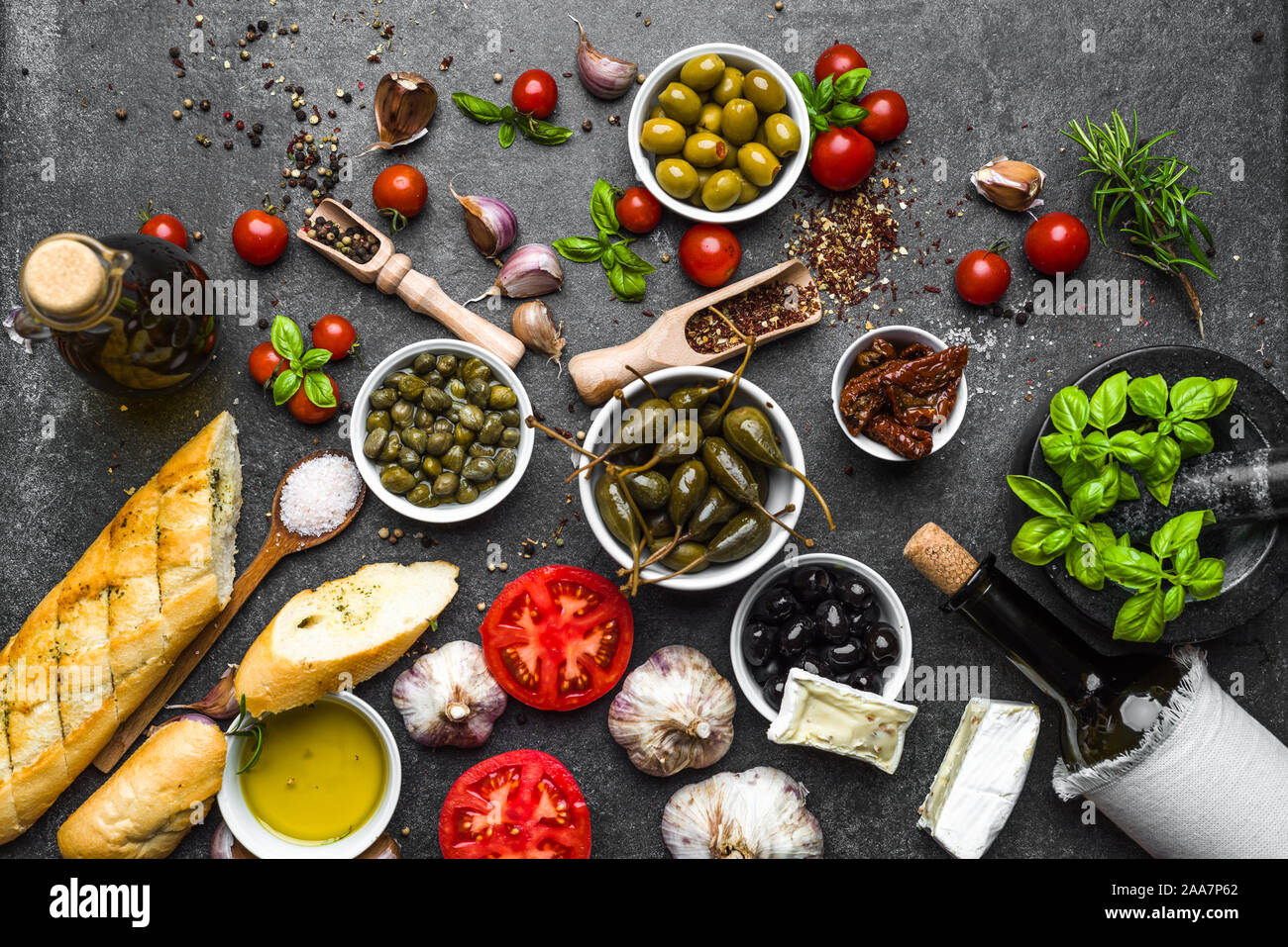 Mediterranean food background. Cooking ingredients on dark slate Stock ...
