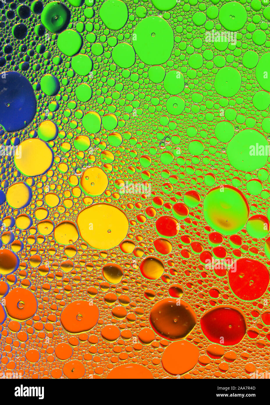 Oil and water with color background creating dreamy smooth diffraction ...