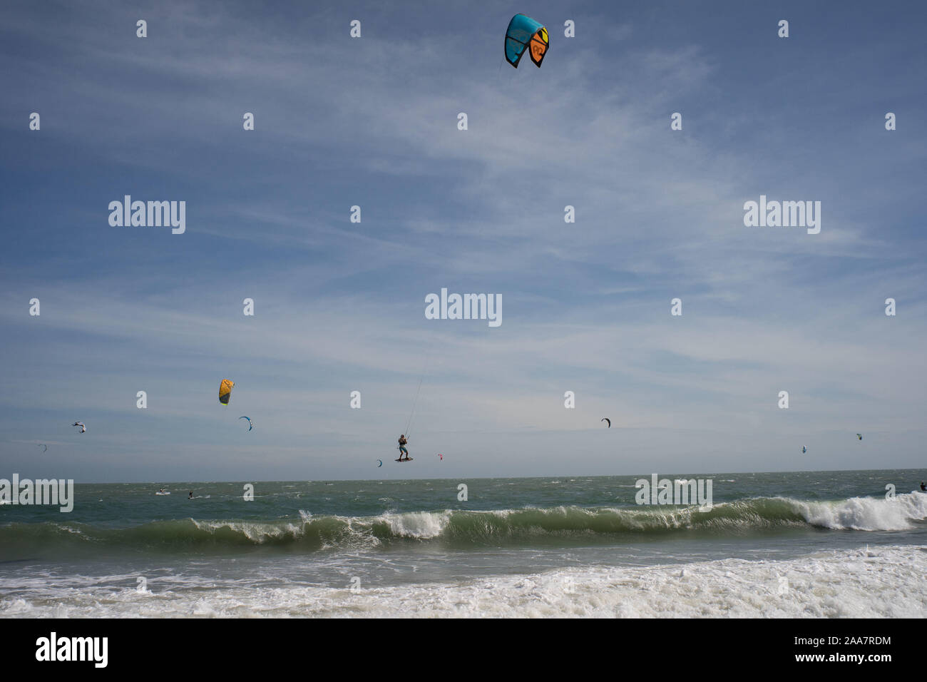 Kite surfer jumping over waves Stock Photo - Alamy