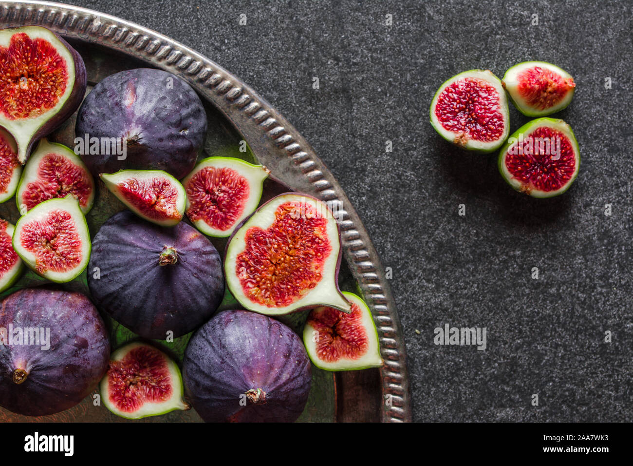 Figs fig slices on black hi-res stock photography and images - Alamy