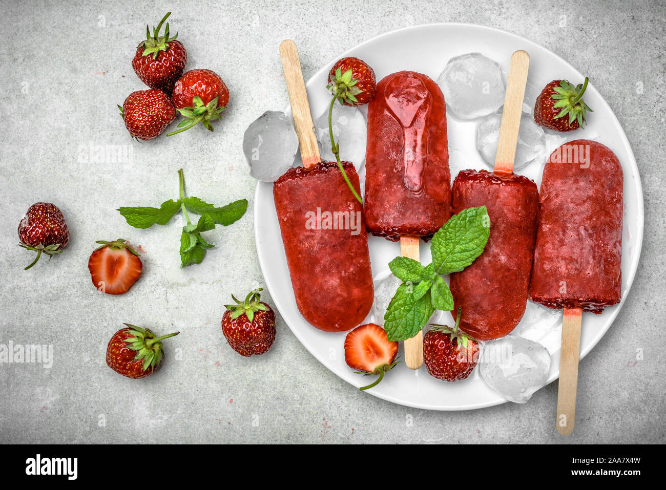 Frozen fruit popsicles, strawberry dessert with iced strawberries Stock ...