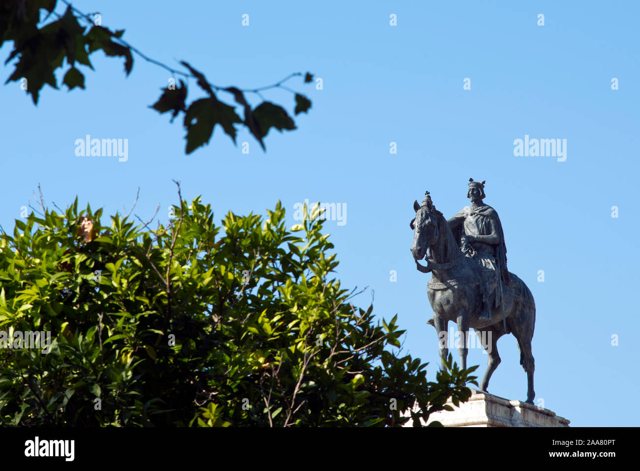 Seville, Spain. Statue of San Fernando (Saint Ferdinand), patron saint ...