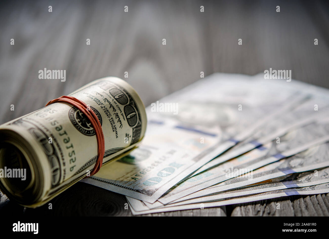 Dollar bills tied rubber band hi-res stock photography and images - Alamy