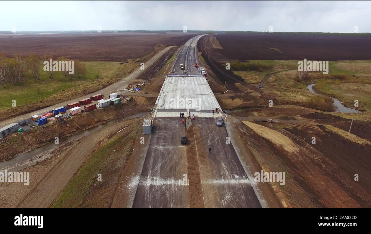 Aerial view new Highway Drone flies over the construction of a new ...