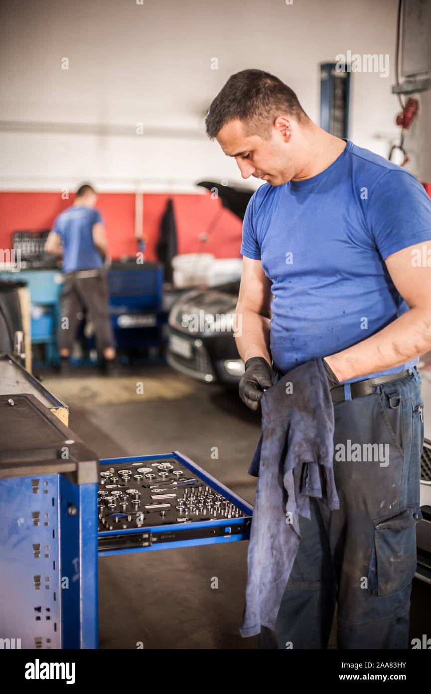 Car master mechanic working in auto vulcanizing and vehicle service ...