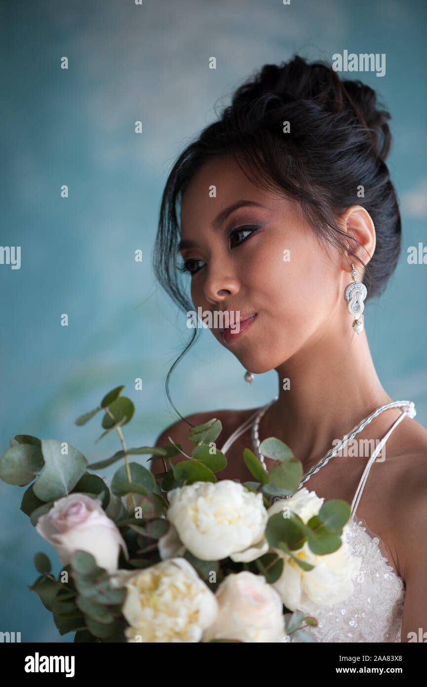 Portrait of beautiful young asian bride woman in white dress and ...
