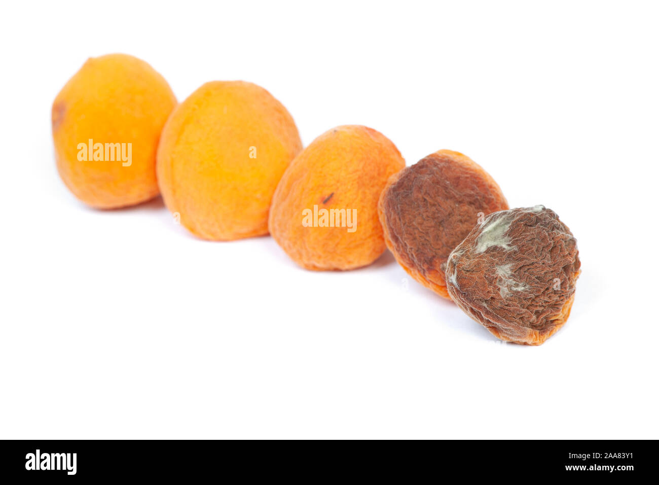 Group of rotten apricots isolated on white Stock Photo - Alamy