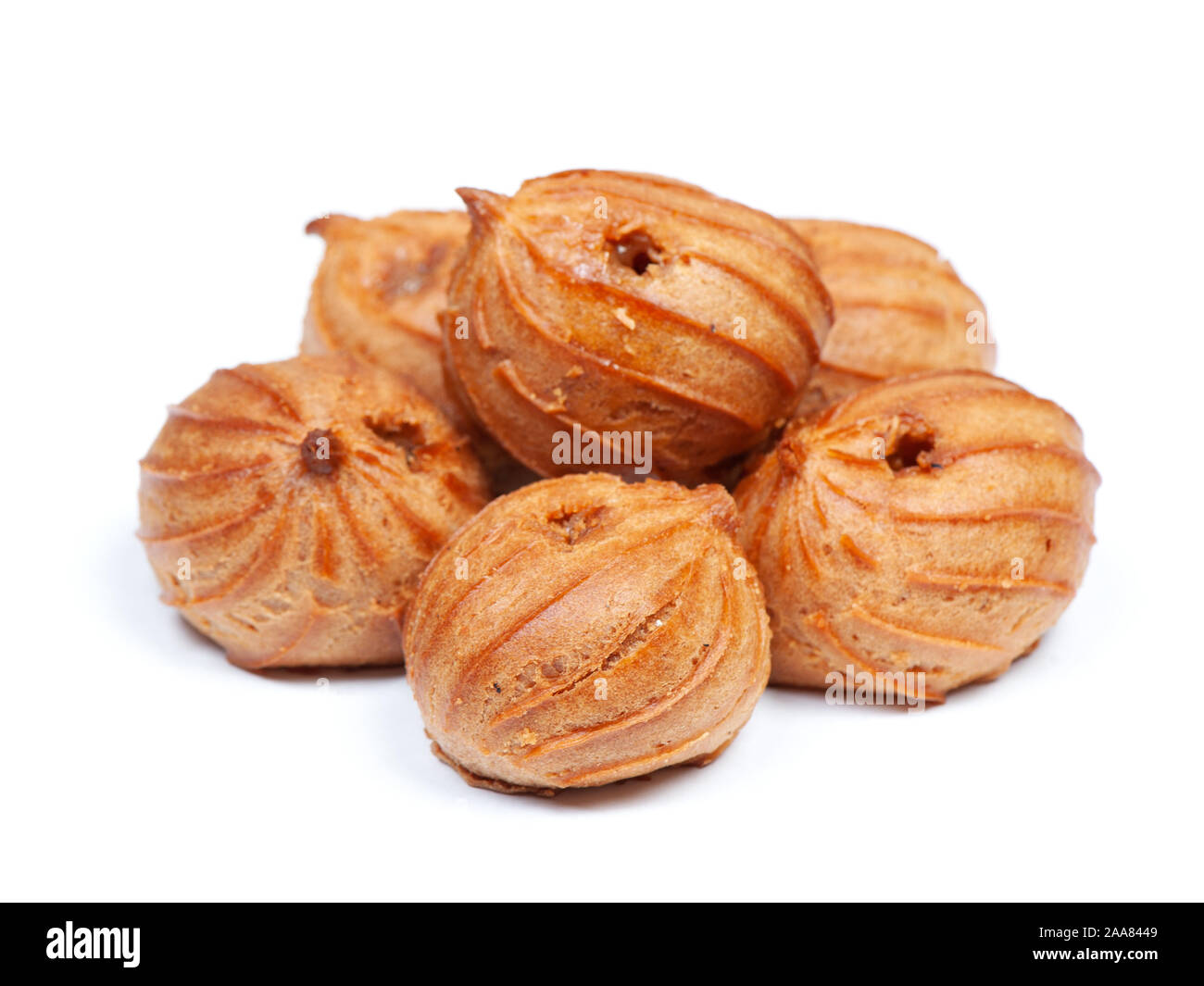 Group of small custard cakes isolated on white Stock Photo - Alamy