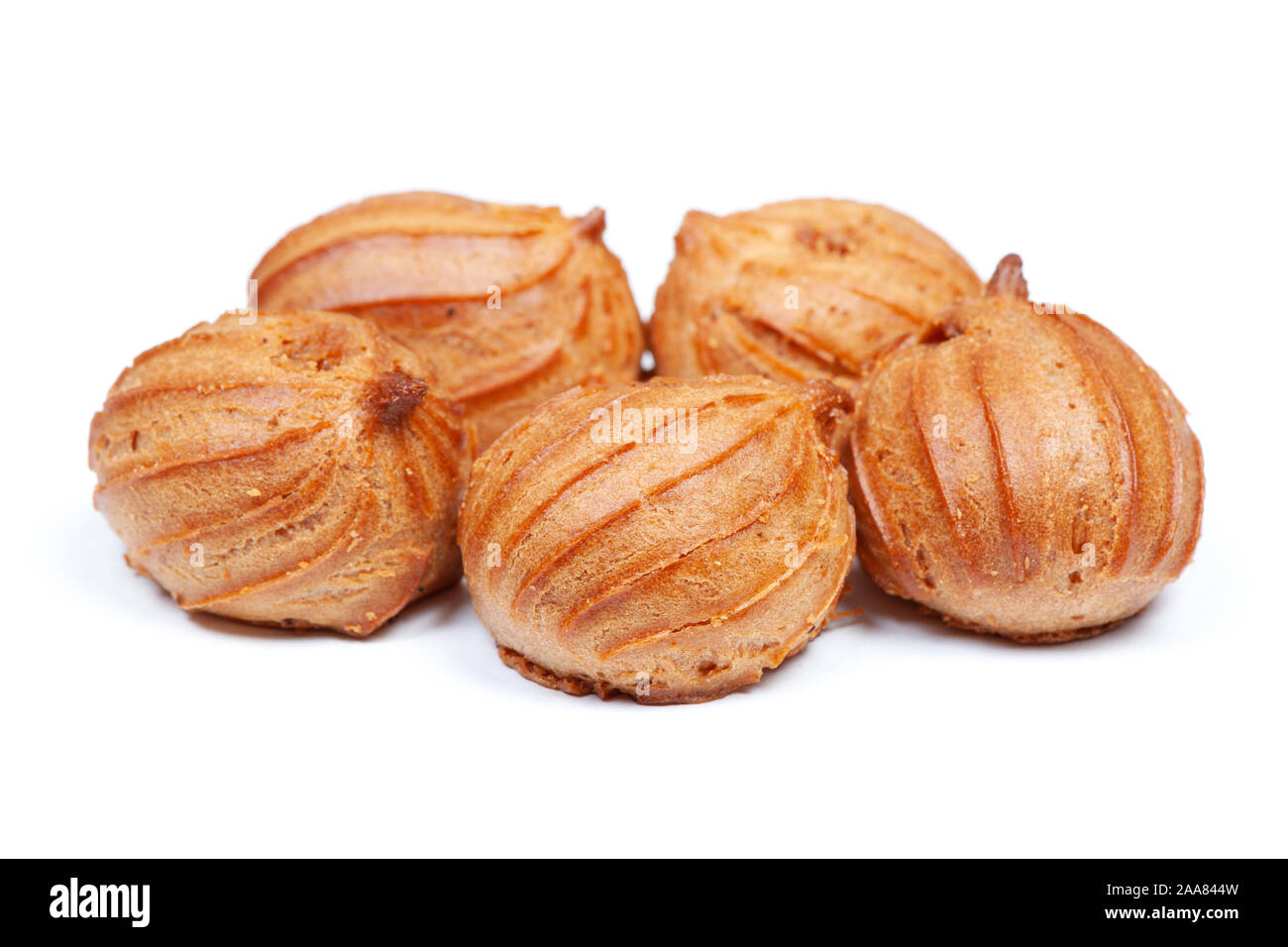 Group of small custard cakes isolated on white Stock Photo - Alamy