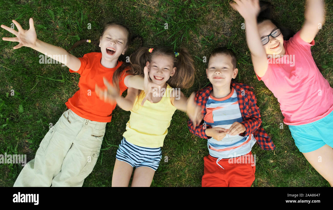 Happy kids having fun in a park hi-res stock photography and images - Alamy