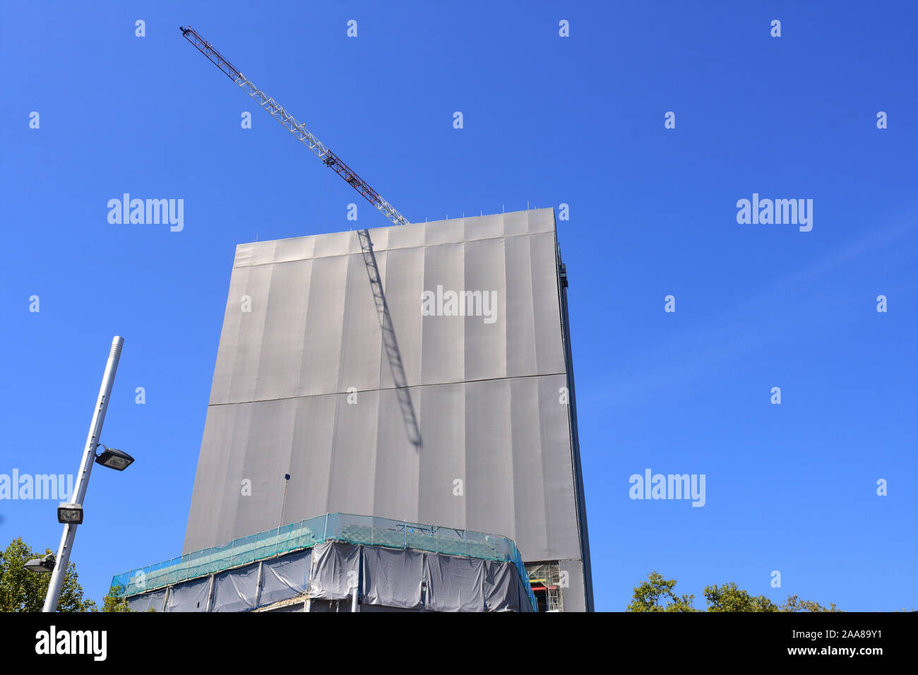 Under construction building covered fabric hi-res stock photography and ...