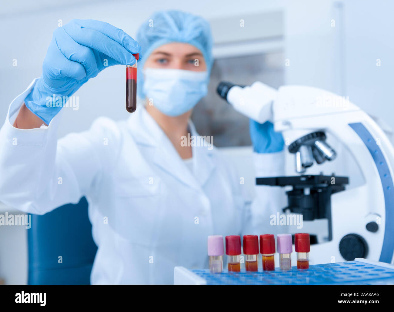 Lab assistant holding blood sample hi-res stock photography and images ...