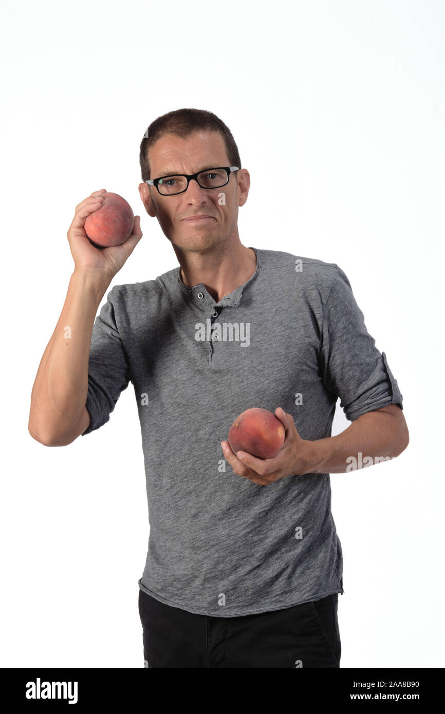 Man eating peach hi-res stock photography and images - Alamy