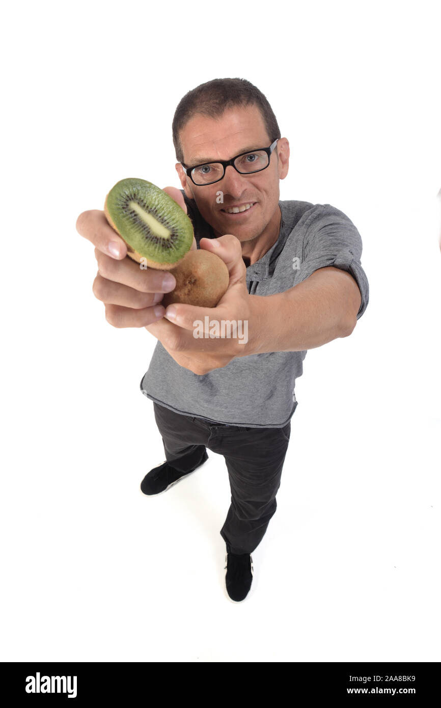 man with kiwi on white background Stock Photo - Alamy