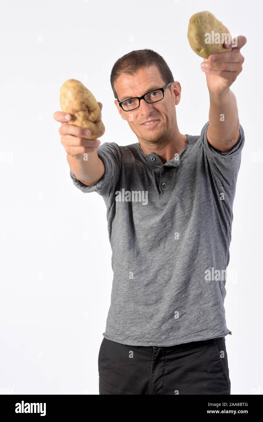 portrait of a man with potato on white background Stock Photo - Alamy
