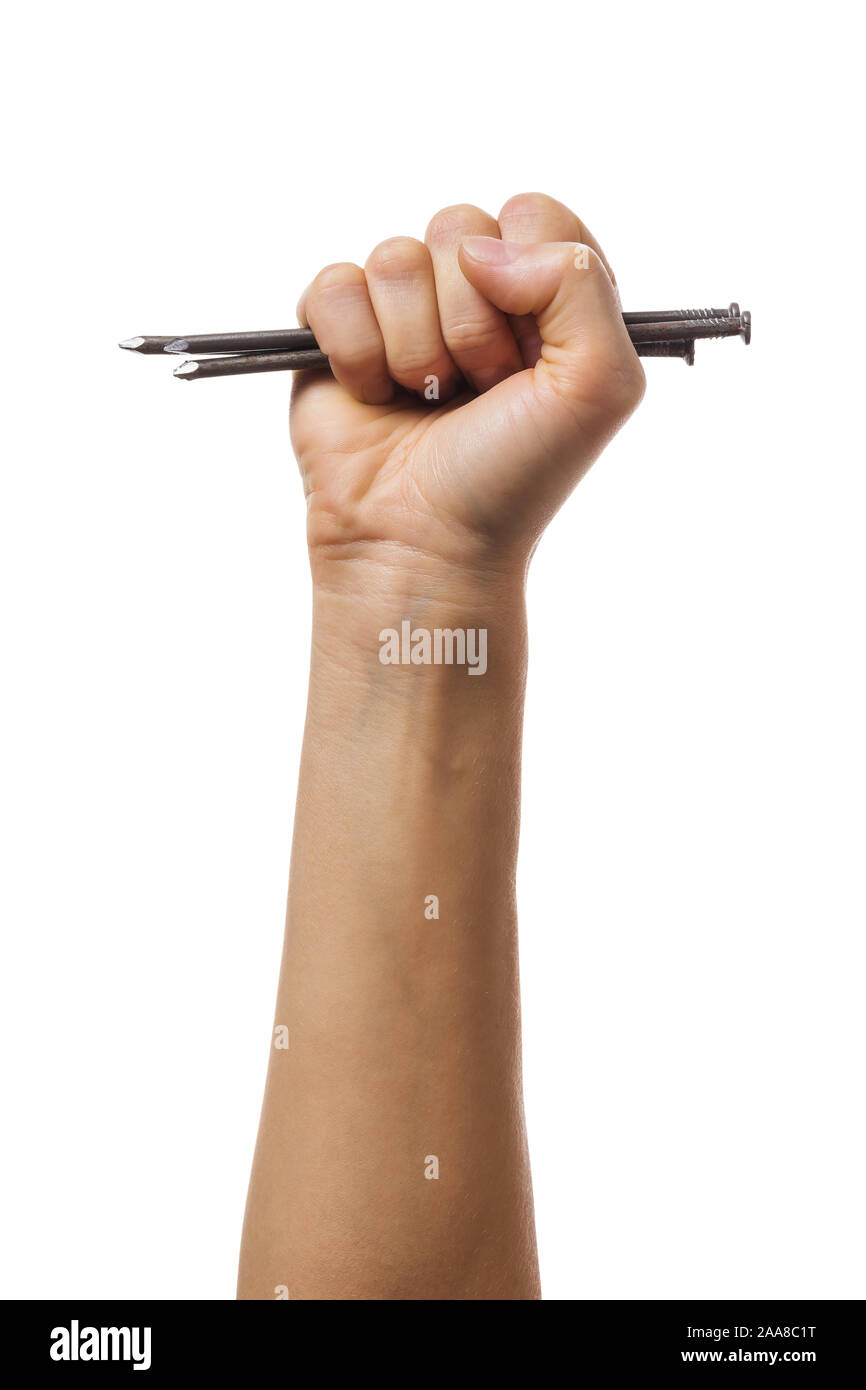 Female hand raised up holds nails isolated on white background Stock ...