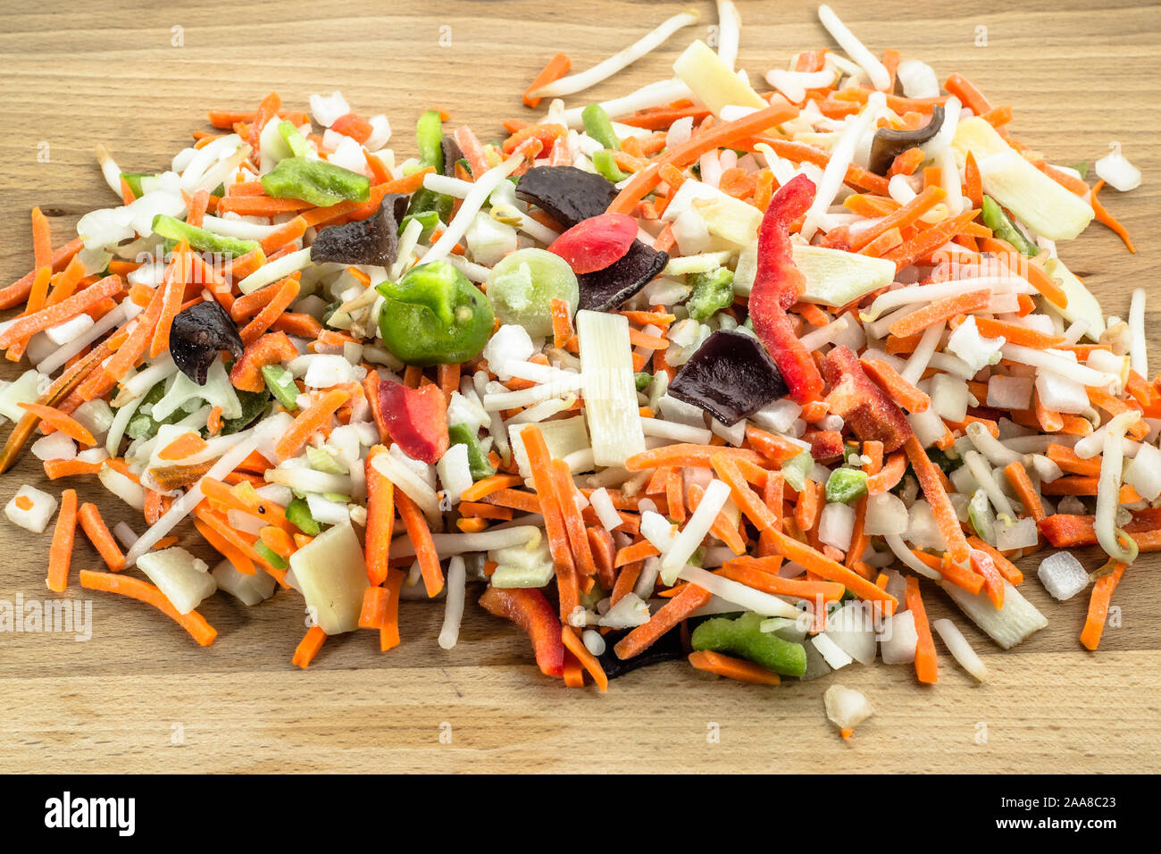 Chinese vegetables sliced in strips on wooden board Stock Photo - Alamy