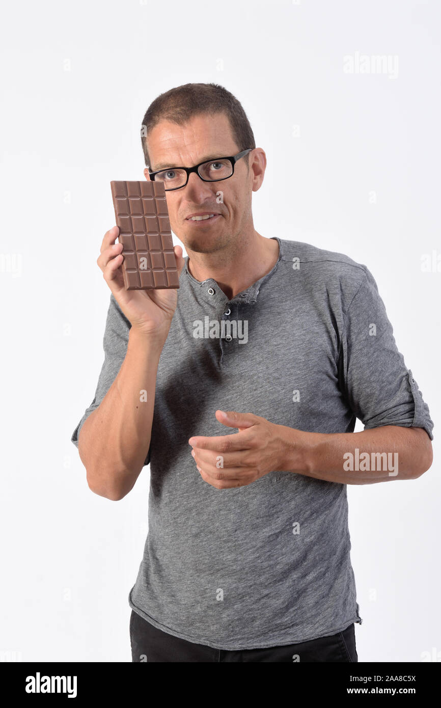 man with chocolate on white background Stock Photo - Alamy