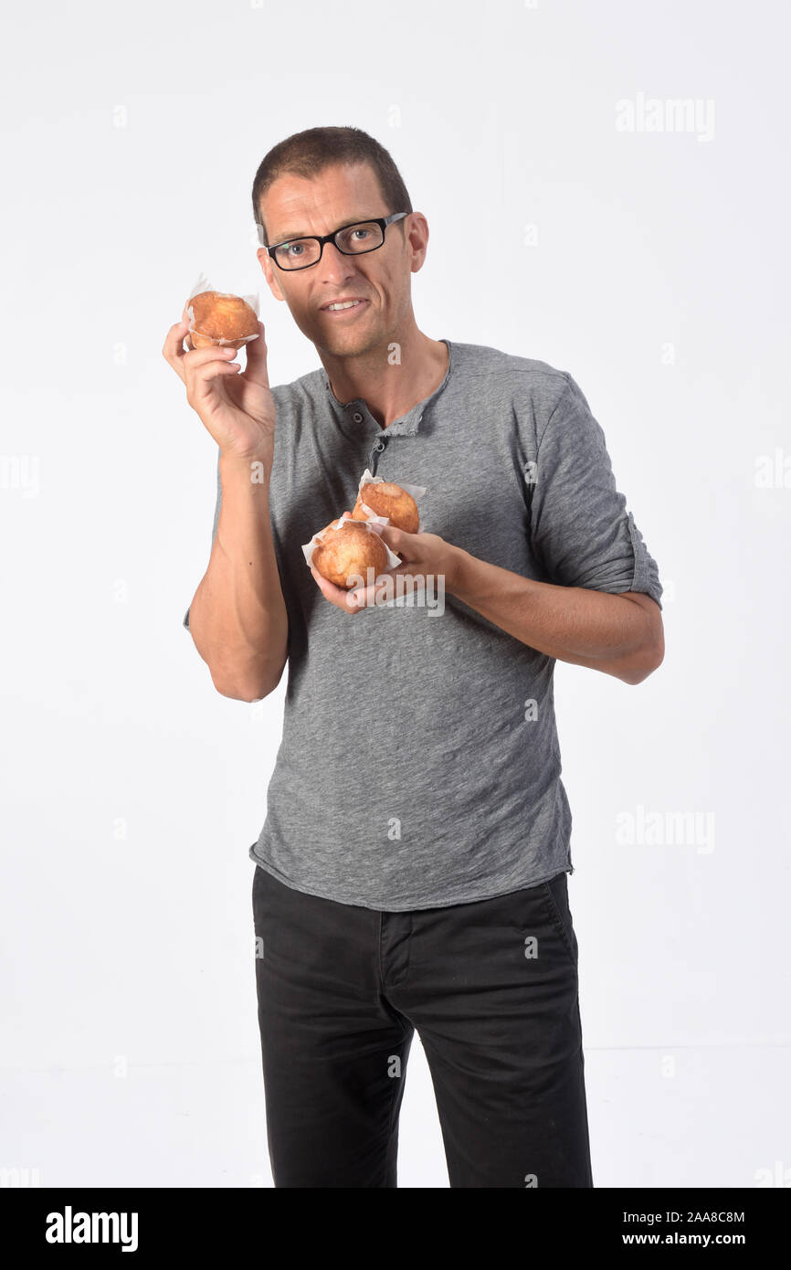 man with muffin on white background Stock Photo - Alamy