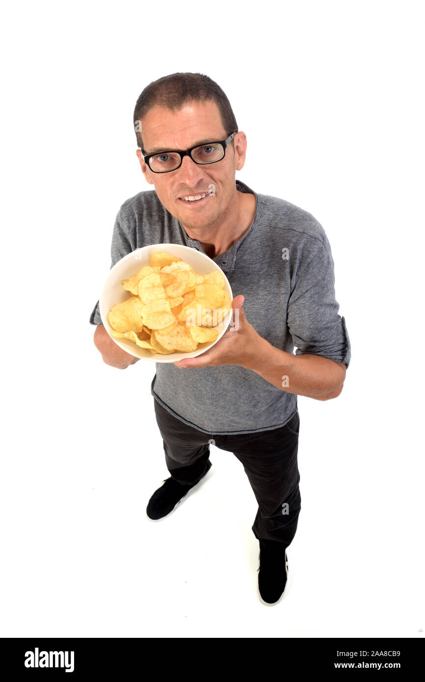 man with chips on white background Stock Photo - Alamy