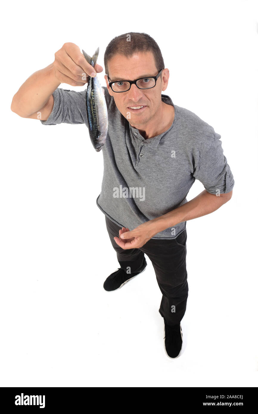 man with mackerel on white background Stock Photo - Alamy