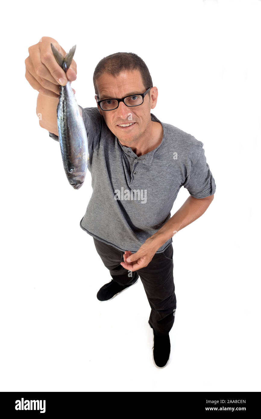 man with mackerel on white background Stock Photo - Alamy