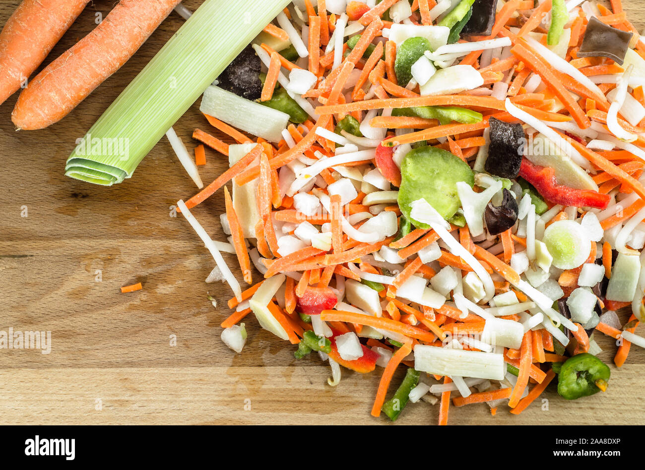 Chinese vegetables sliced in strips on wooden board, top view Stock ...