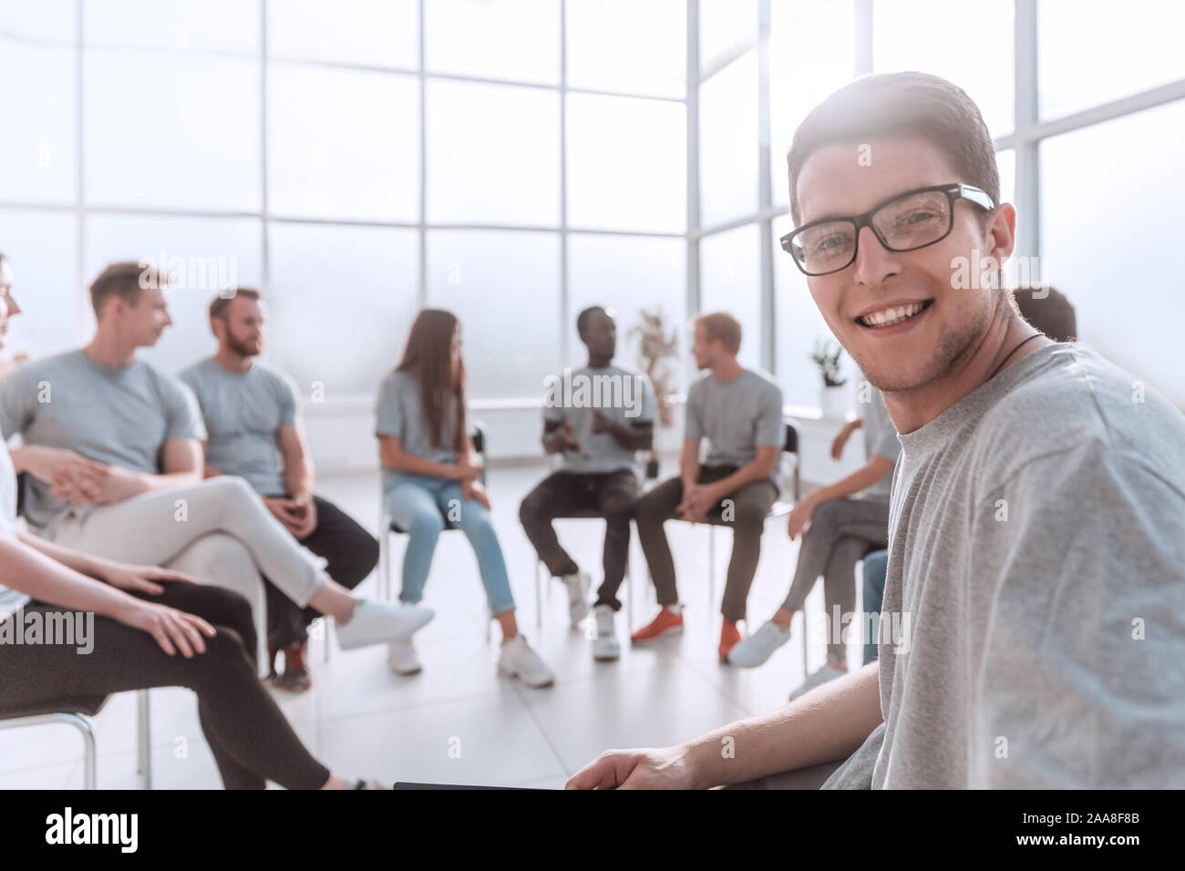 professional business coach sitting in a team building class Stock ...