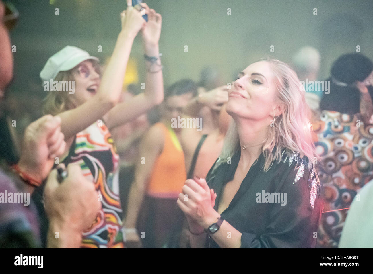 Party goers at the Lost in Disco club night at Bush Hall in London ...