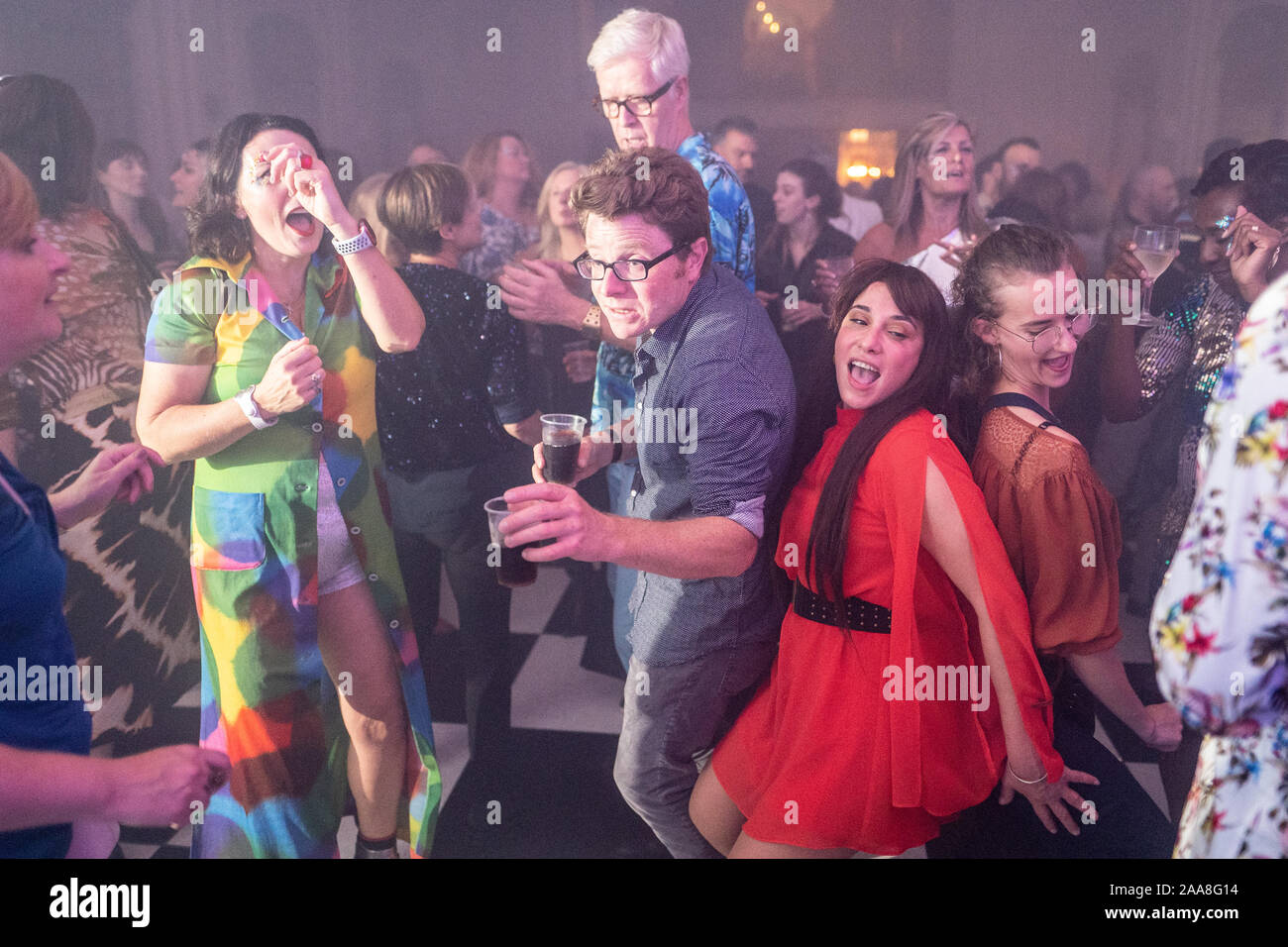 Party goers at the Lost in Disco club night at Bush Hall in London ...