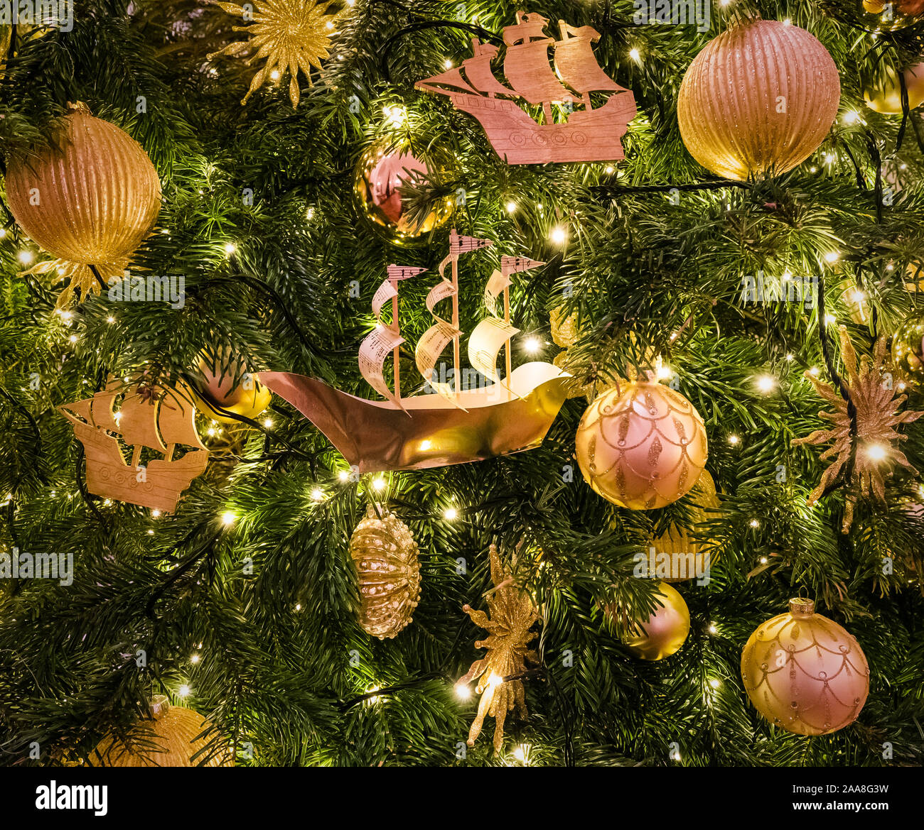 Christmas tree decorated with a gold ships at Waddesdon Manor Stock ...