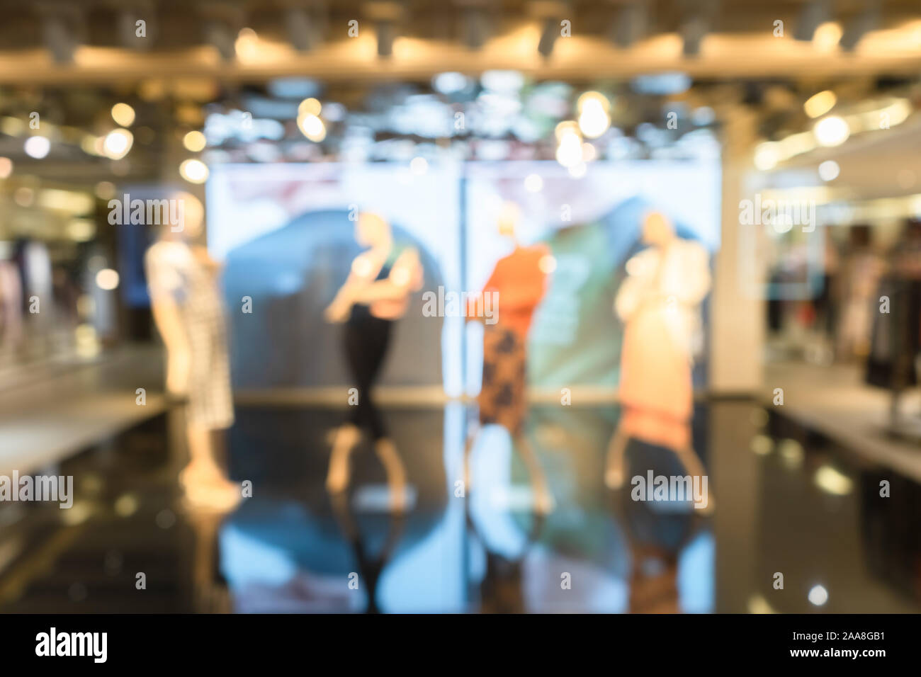 Blurred background, blur boutique display clothing store in shopping ...
