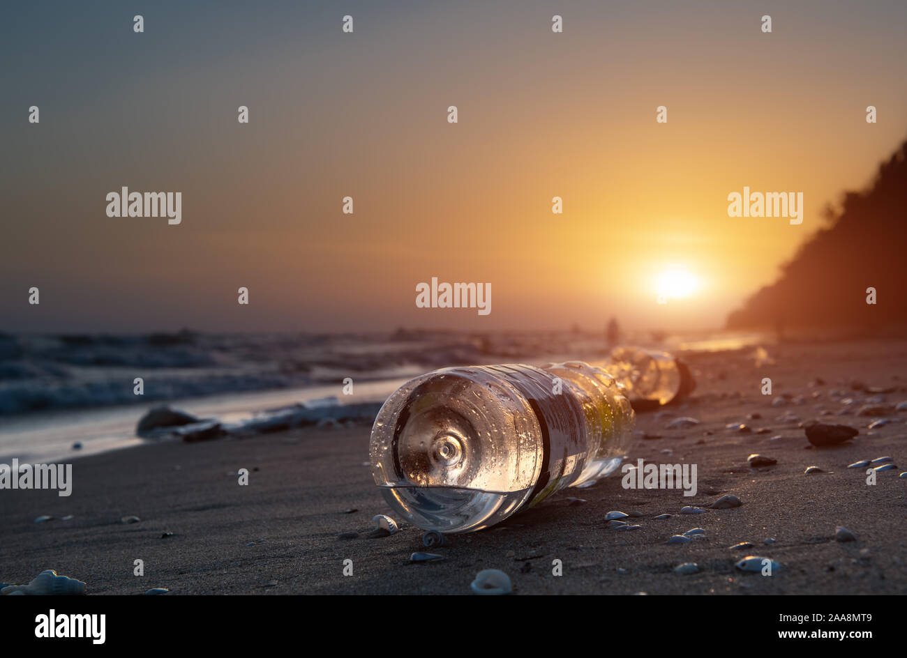 Plastic bottle garbage on the beach in pollution sea scape environment ...