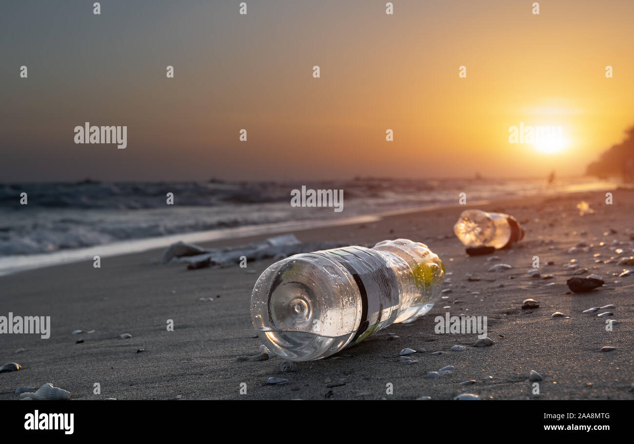 Plastic bottle garbage on the beach in pollution sea scape environment ...