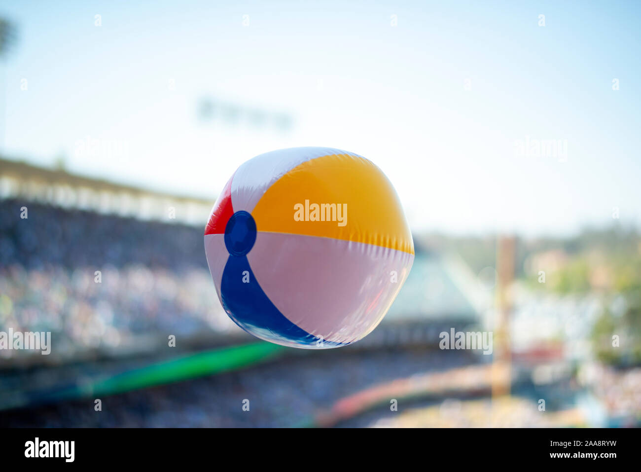 Beach ball floating above the crowd at a stadium event Stock Photo - Alamy