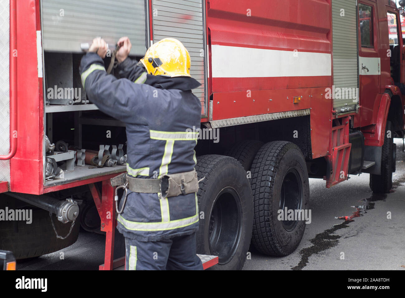The fire brigade works at a source of ignition in a residential ...