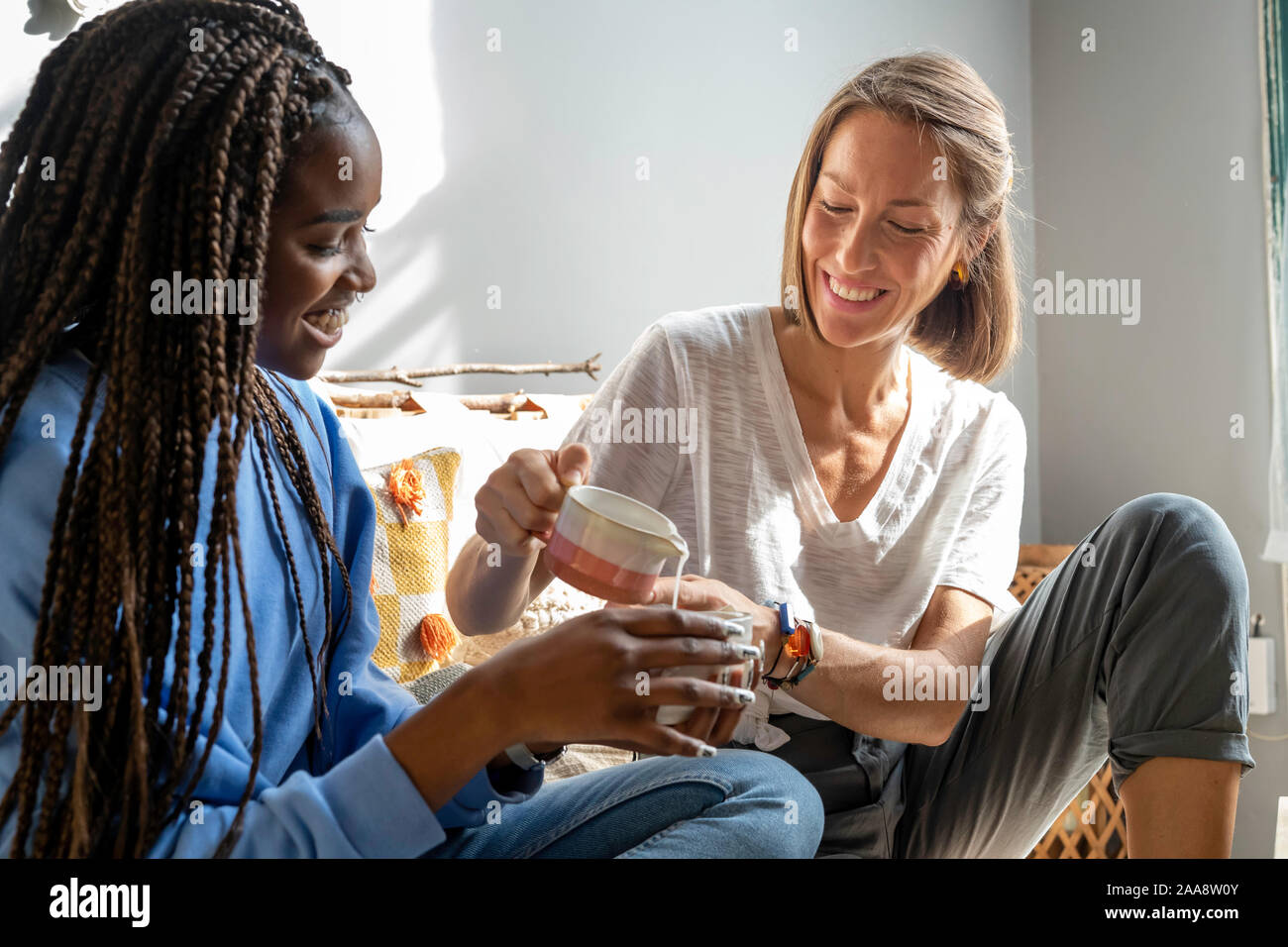 Two friends drinking tea hi-res stock photography and images - Alamy