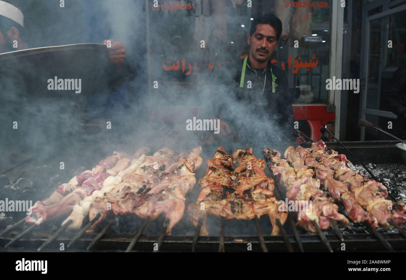 (191120) -- KABUL, Nov. 20, 2019 (Xinhua) -- A man makes Kebab, a ...