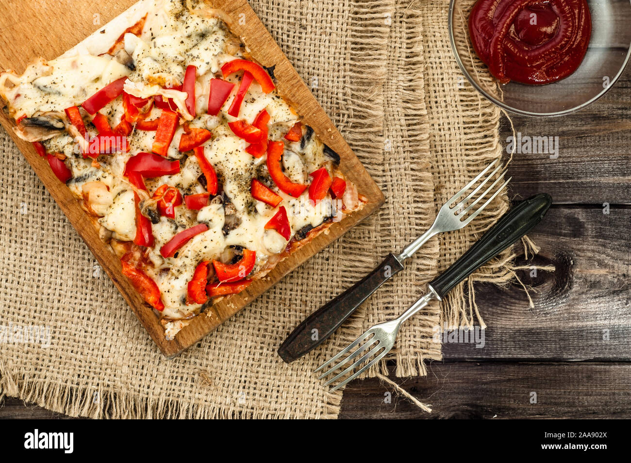Slice of pizza, top view on wooden background, homemade baking concept ...
