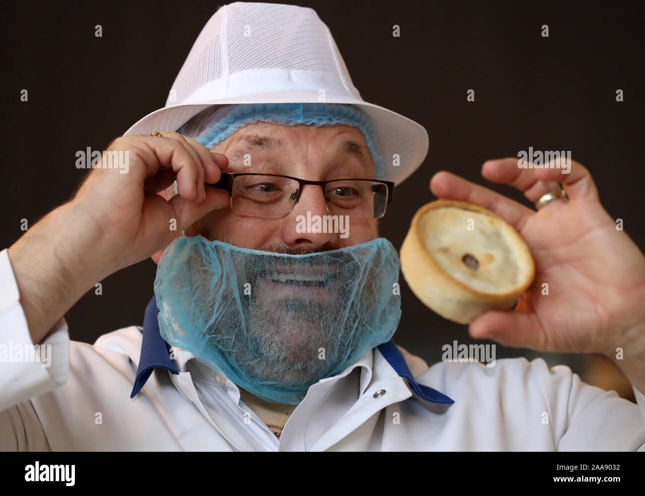 Jim McCormack holds a Scotch pie during judging at the 2020 World ...