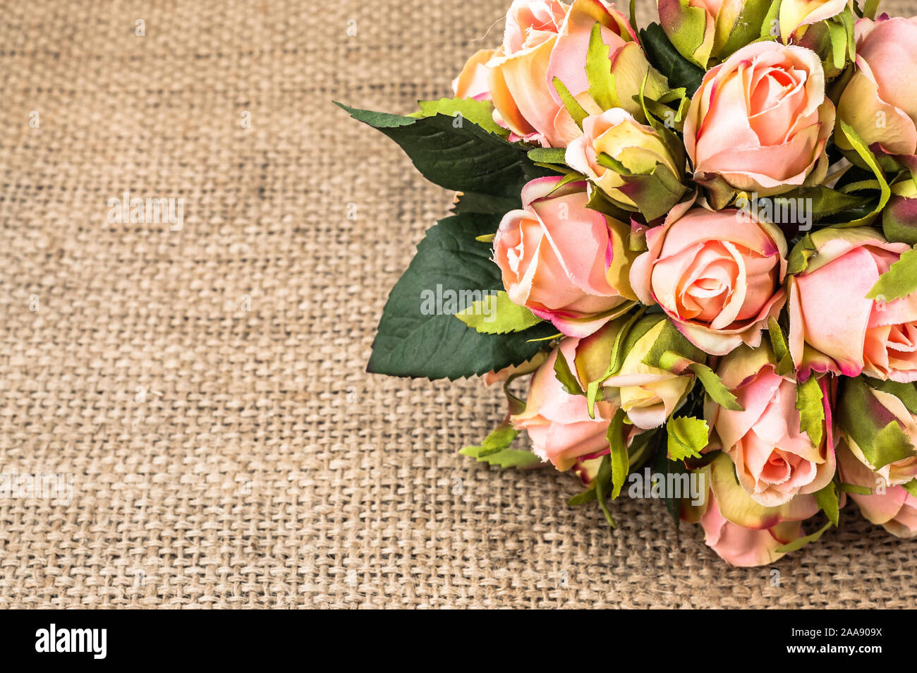 Pink roses on rustic background. Flowers frame, floral greeting card ...