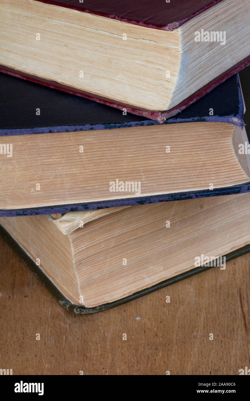 Aged books lying on each other Stock Photo - Alamy