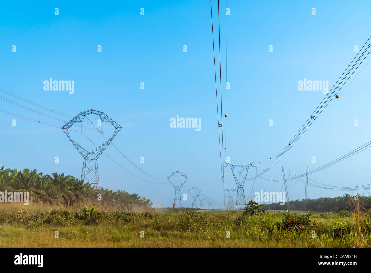 View of high electric voltage transmission tower, power pylon poles and ...
